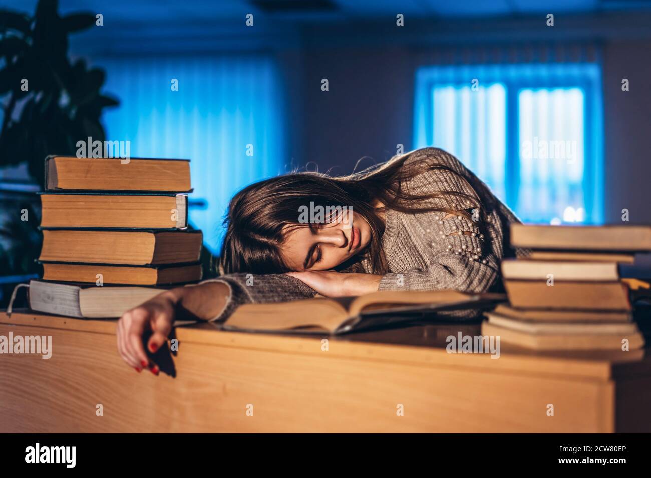 Exhausted tired college student pile hi-res stock photography and ...
