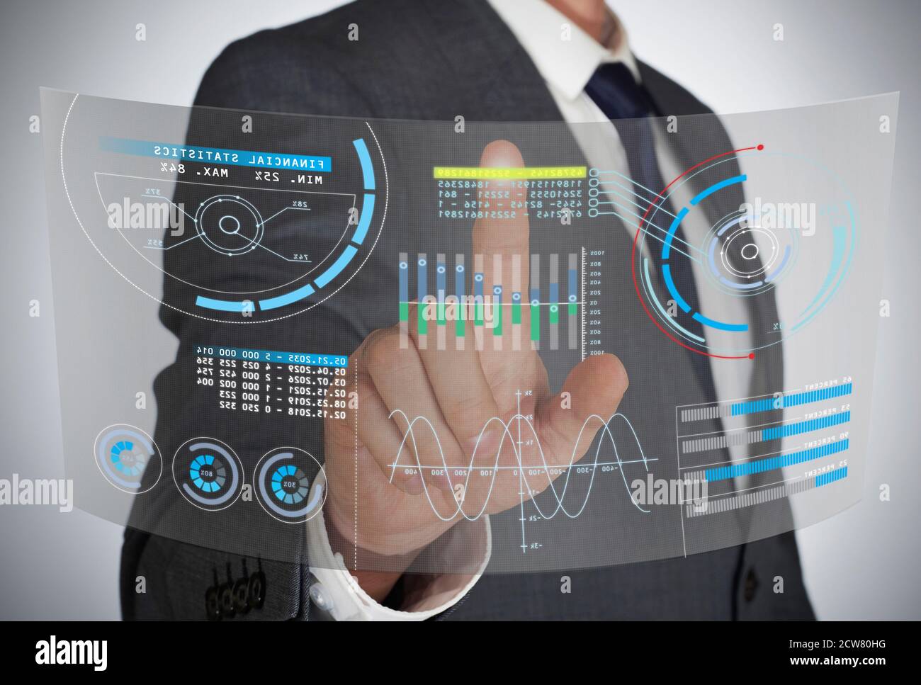 Businessman using a digital virtual touch screen Stock Photo - Alamy