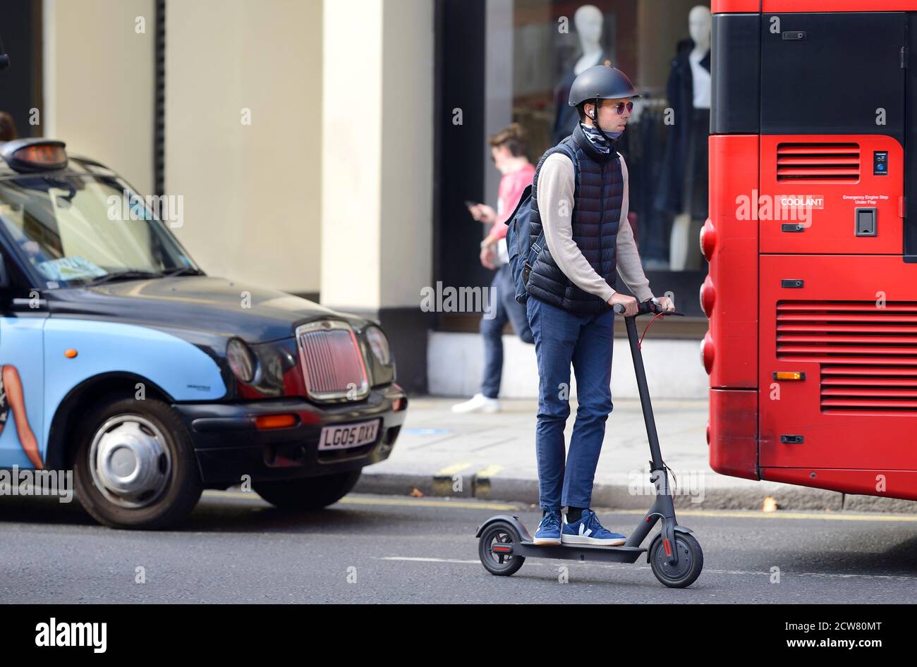London, England, UK. Man on an e-scooter Stock Photo - Alamy