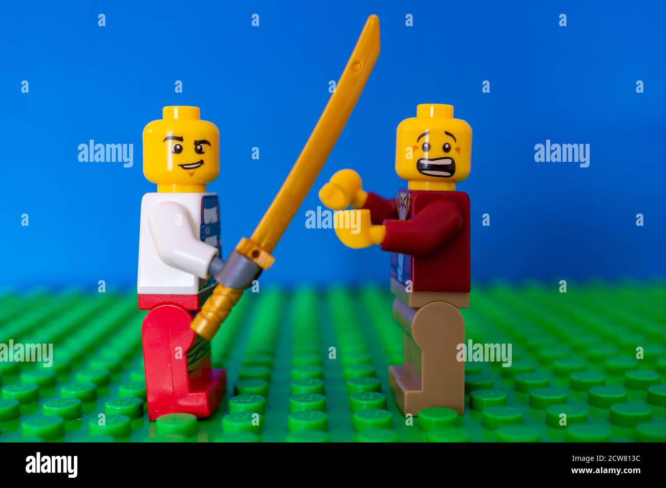 POZNAN, POLAND - Sep 27, 2020: Lego figurine holding a sword in front ...