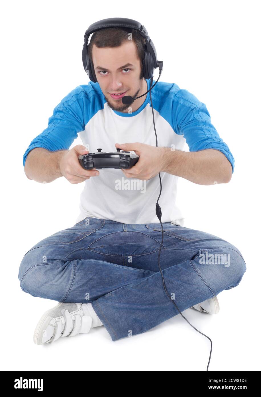 Man playing video games, white background Stock Photo - Alamy