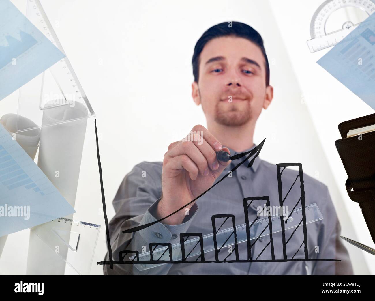 Man working on chart Stock Photo - Alamy