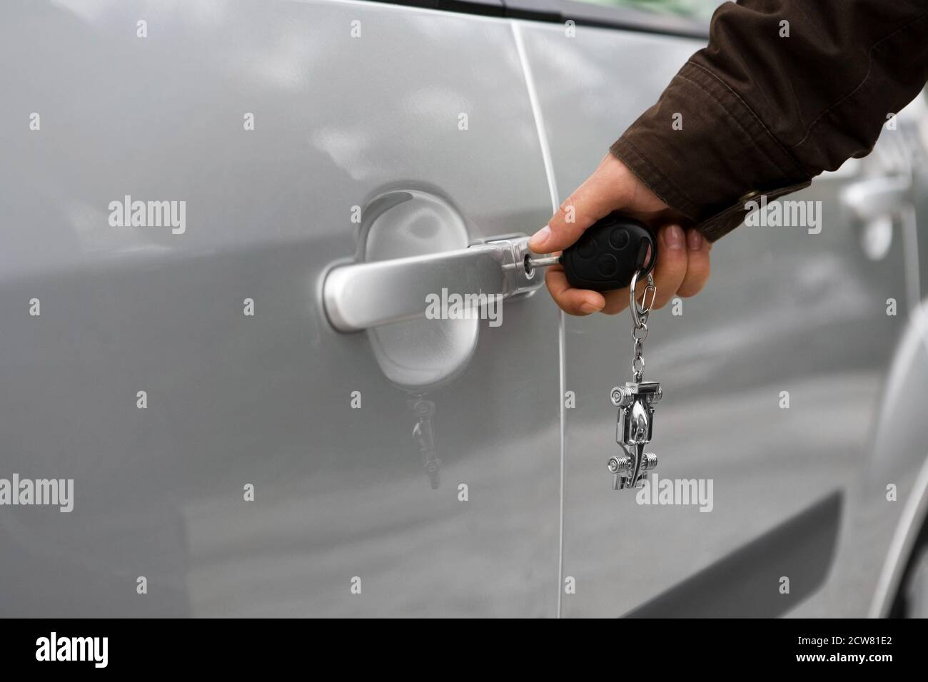 Man opening the car Stock Photo - Alamy