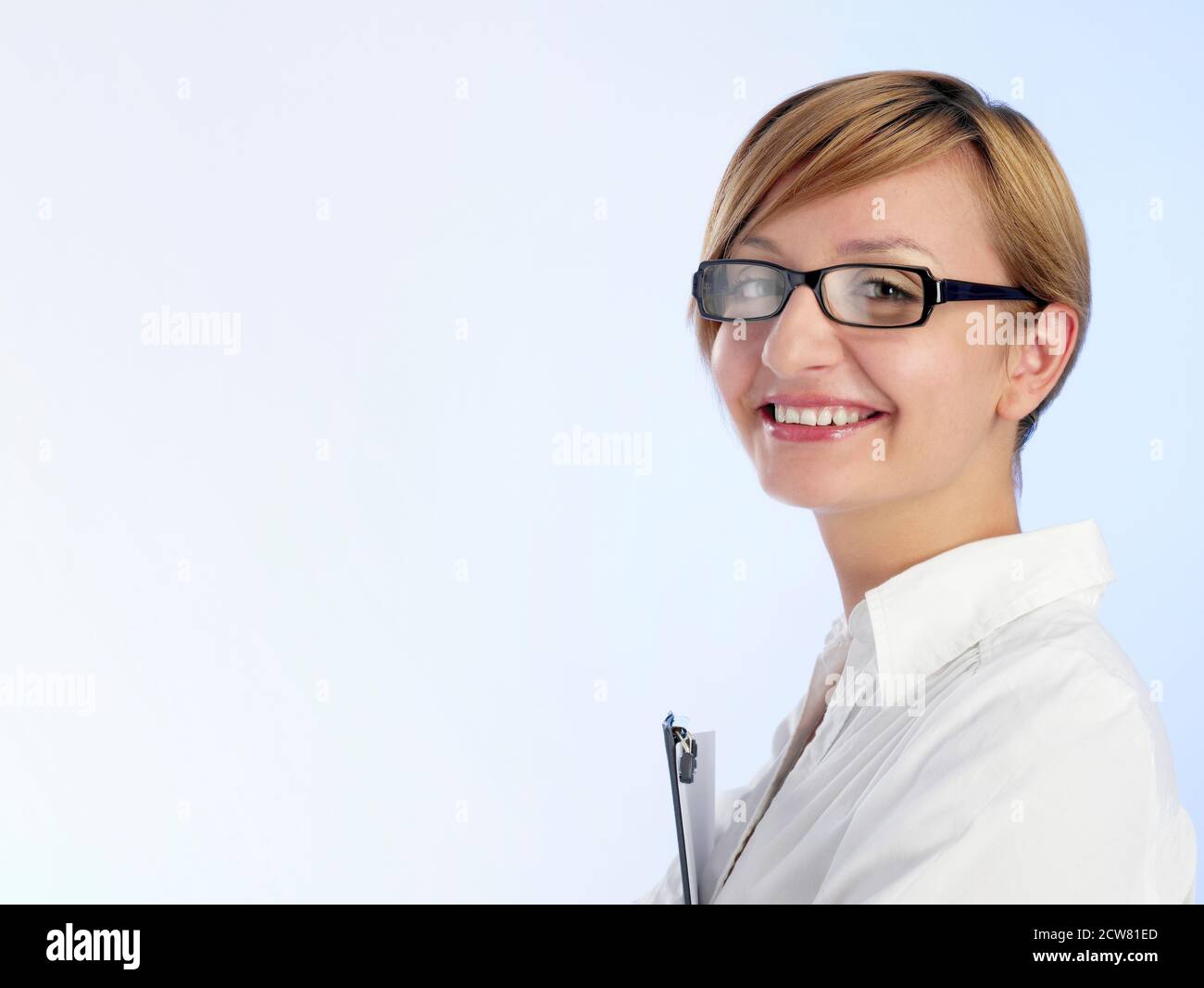 Office woman smiling, isolated Stock Photo - Alamy