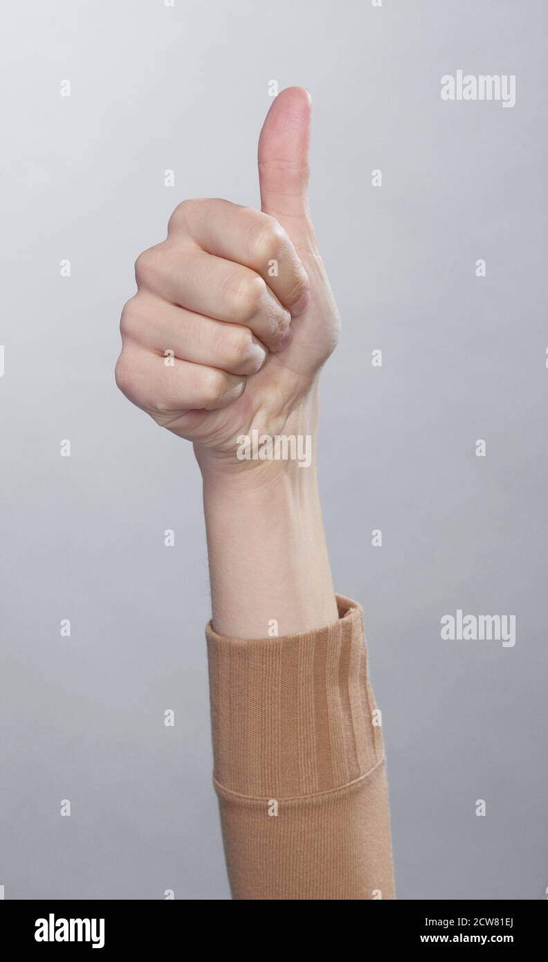 Hand showing ok sign Stock Photo - Alamy