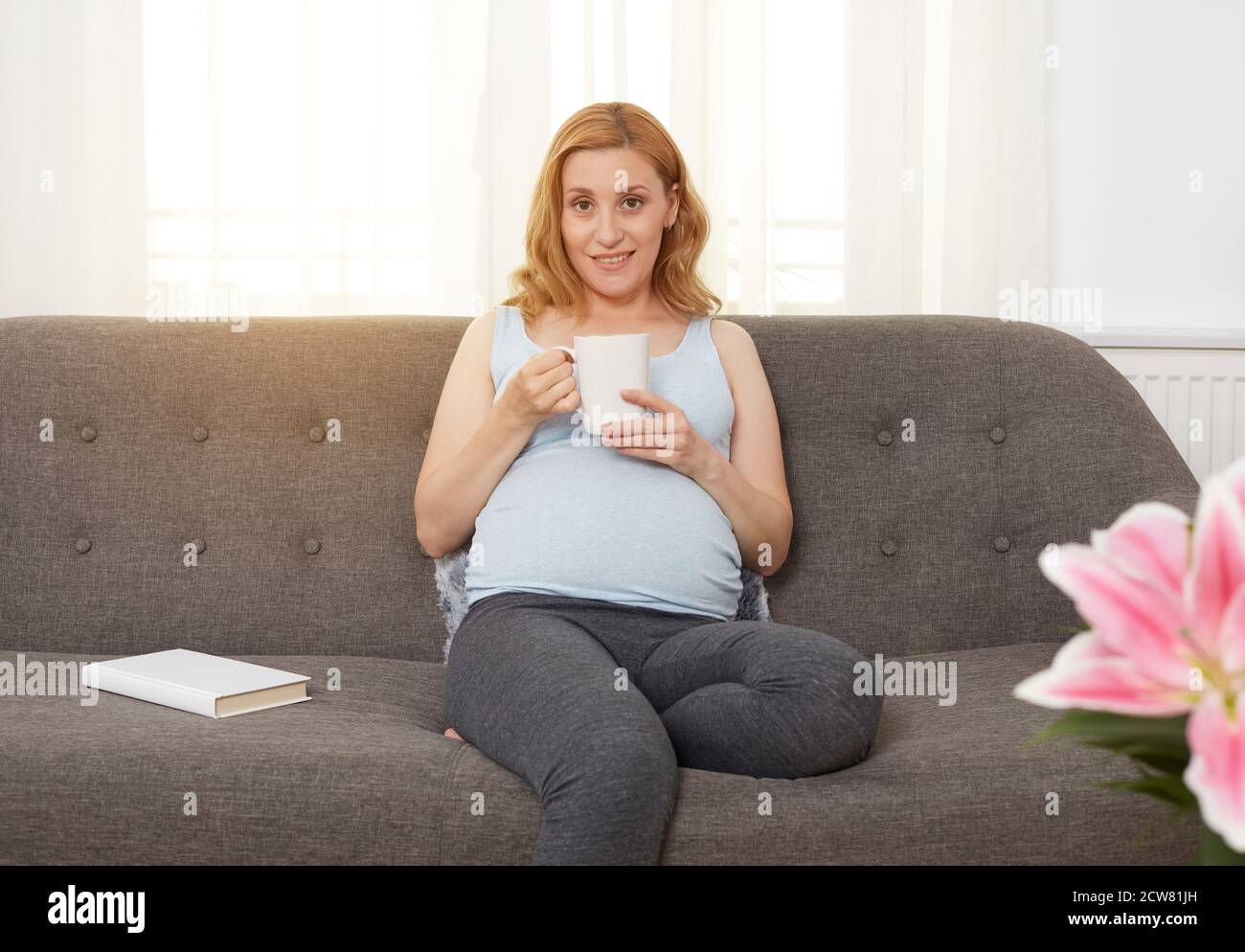Pregnant woman expecting a baby Stock Photo - Alamy