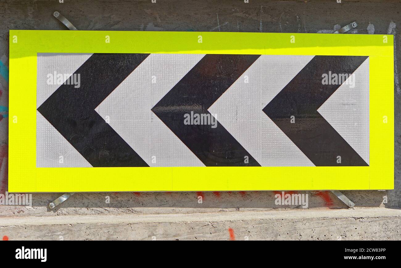 Chevron sharp right curve warning traffic sign arrows Stock Photo - Alamy