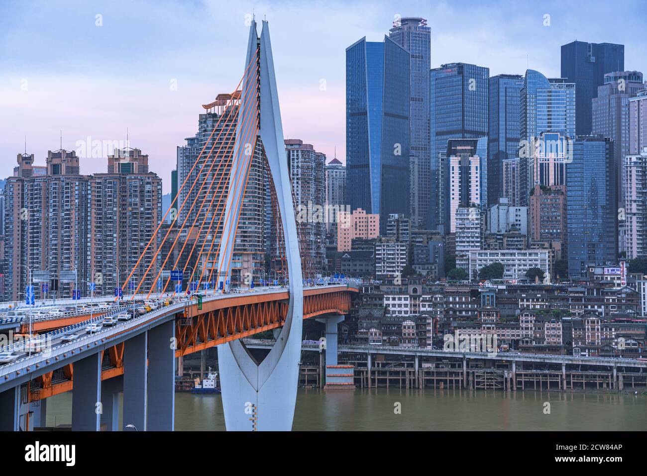 The Qiansimen bridge and the skyline in Chongqing, China, on a cloudy ...