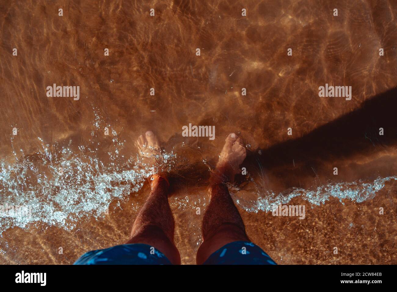 Feet in the water hi-res stock photography and images - Alamy