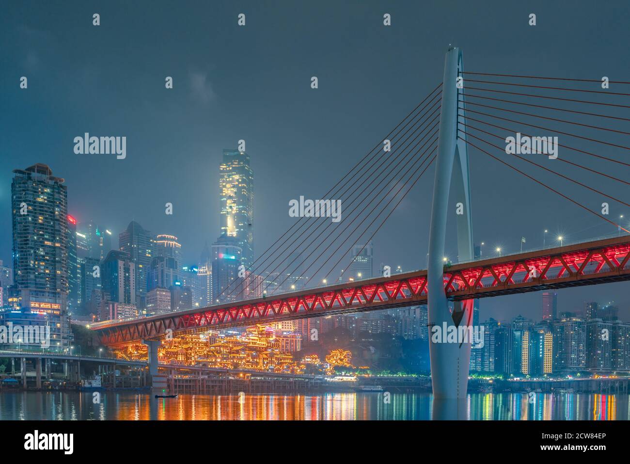 The night view of Qiansimen bridge and the skyline in Chongqing, China ...