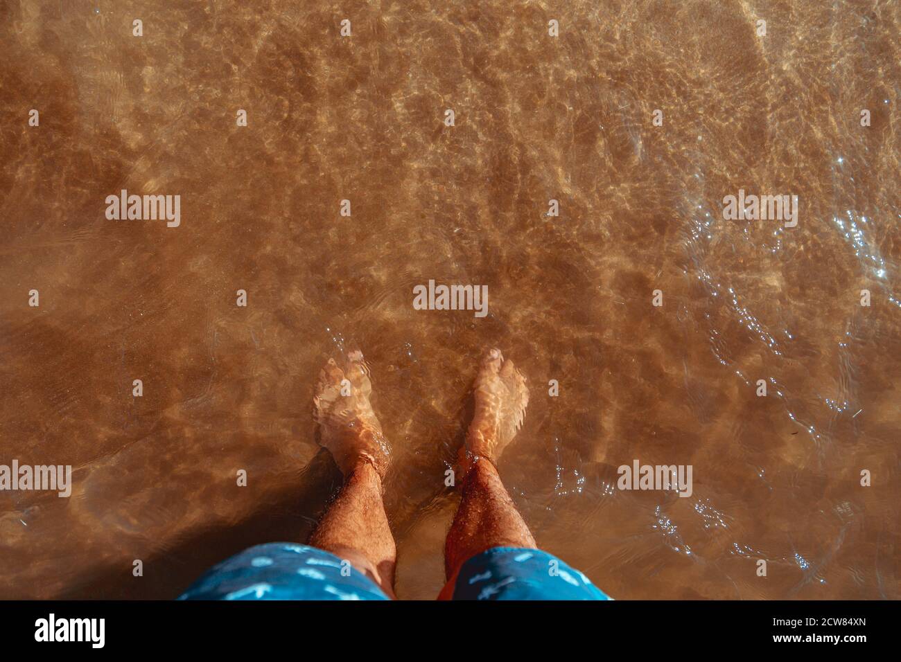 Feet in the water hi-res stock photography and images - Alamy