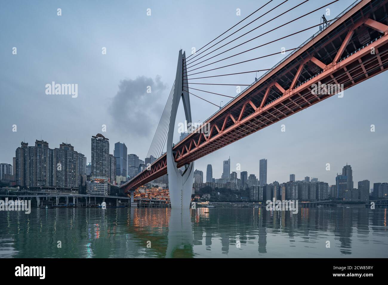 The Qiansimen bridge and the skyline in Chongqing, China, on a cloudy ...