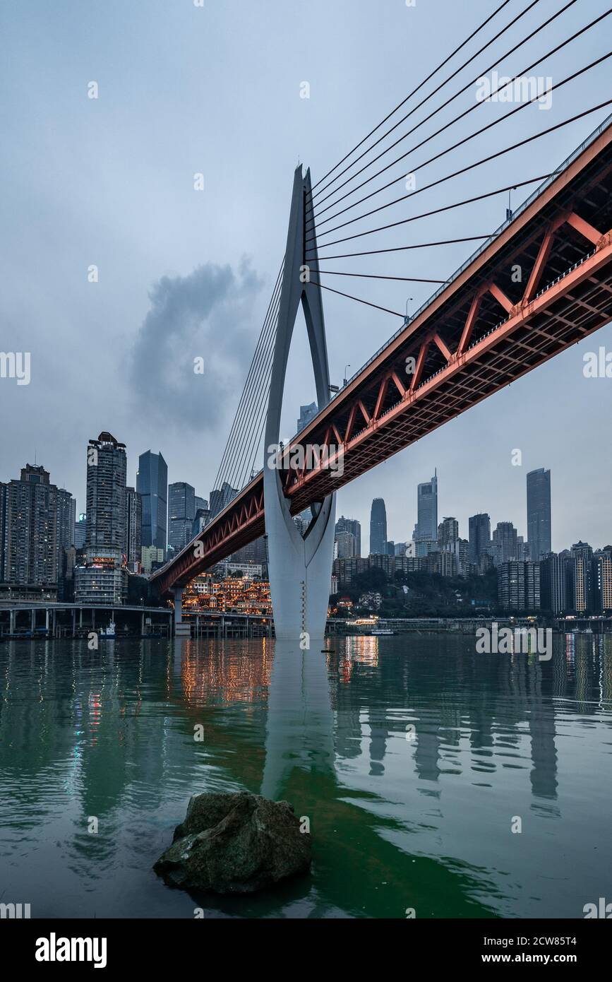The night view of Qiansimen bridge and the skyline in Chongqing, China ...