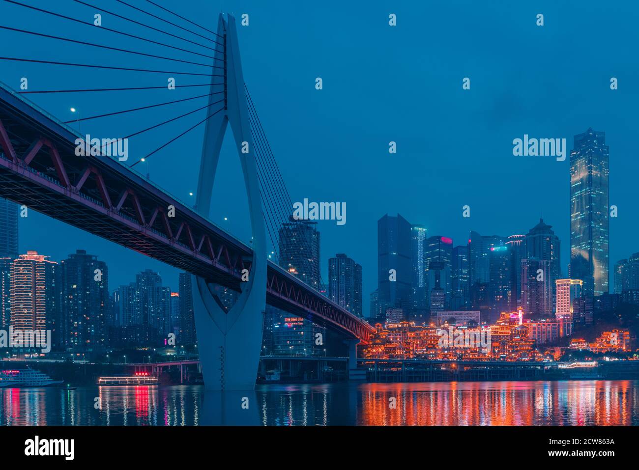 The night view of Qiansimen bridge and the skyline in Chongqing, China ...