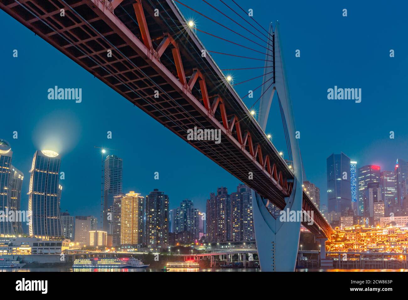 The night view of Qiansimen bridge and the skyline in Chongqing, China ...