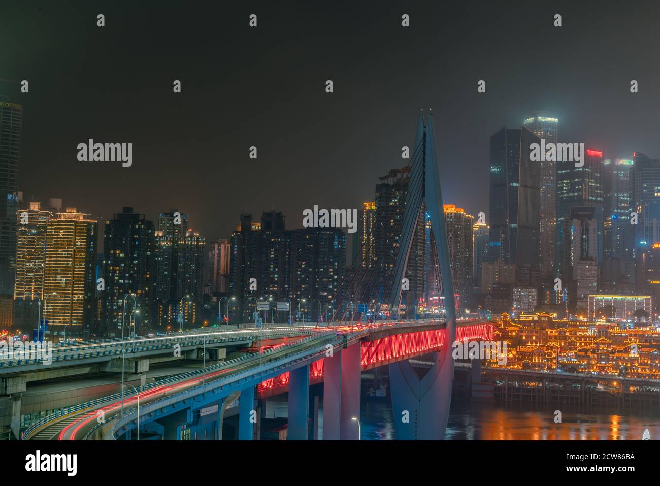 The night view of Qiansimen bridge and the skyline in Chongqing, China ...