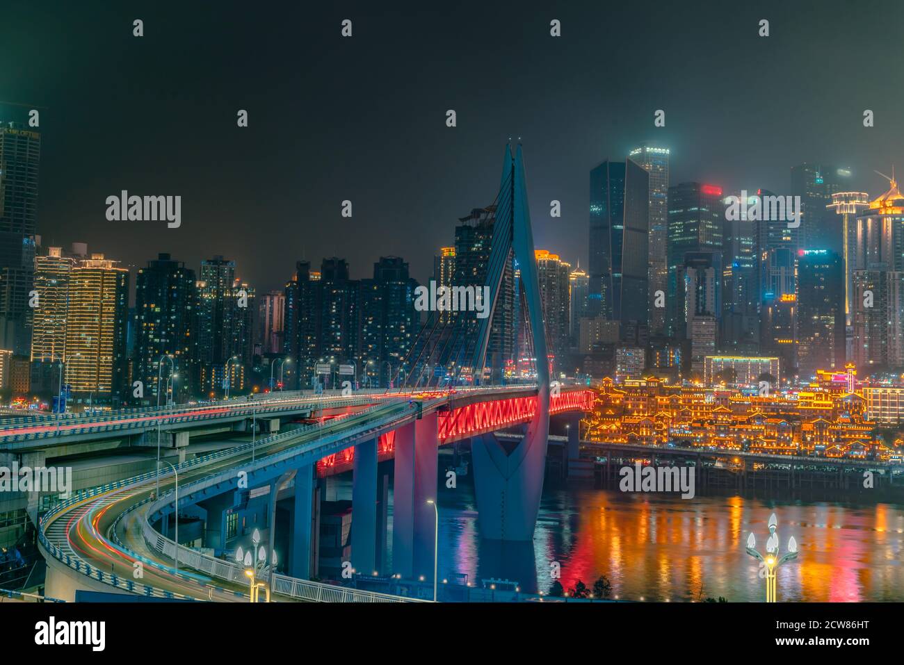 The night view of Qiansimen bridge and the skyline in Chongqing, China ...
