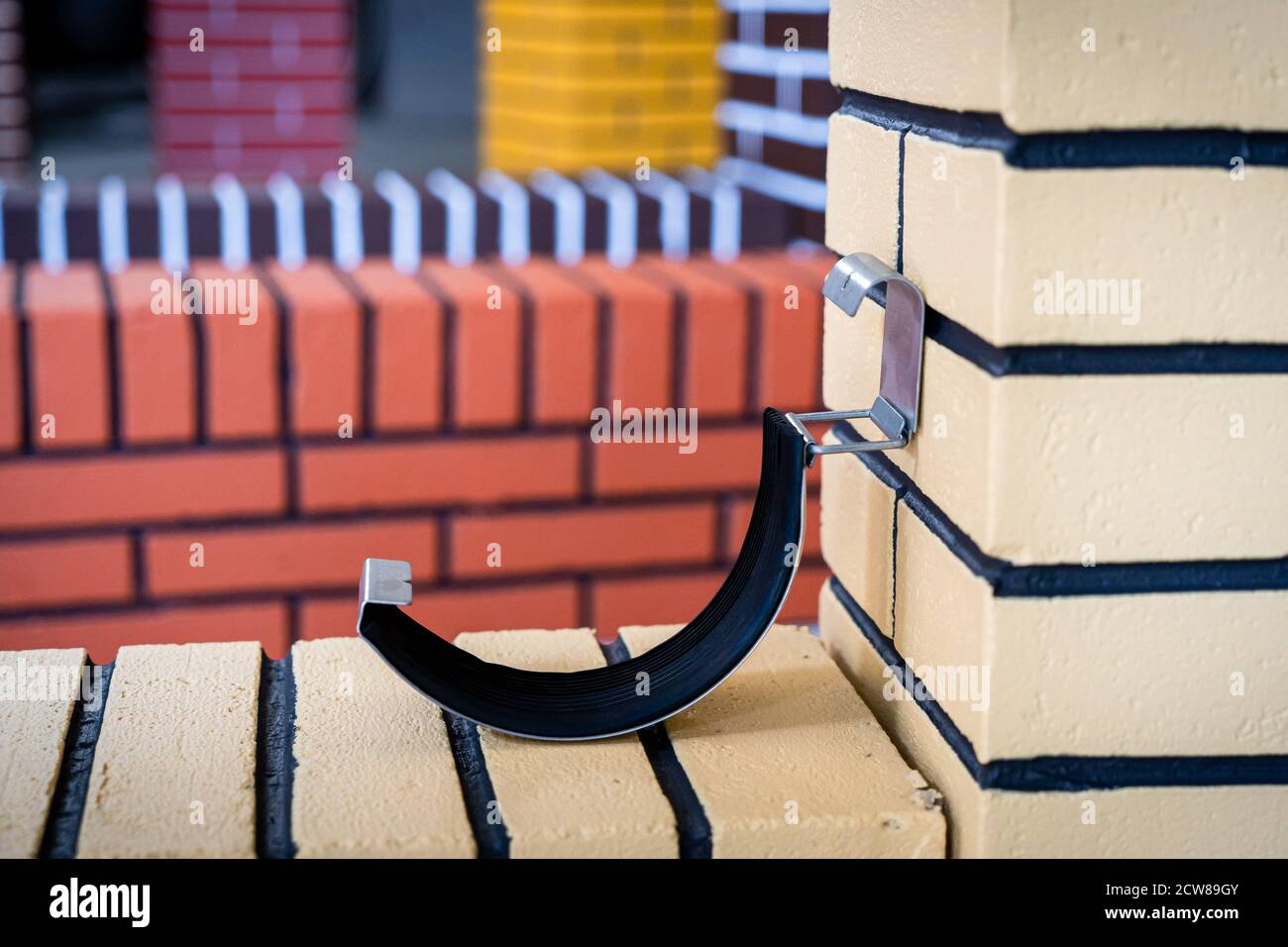 Elements of roof system drainage hook pipe plug holder Stock Photo - Alamy