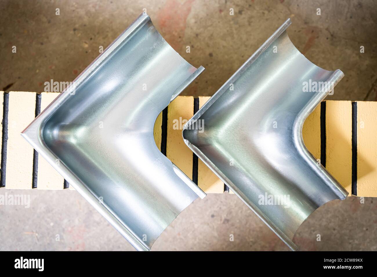 Elements of roof system drainage hook pipe plug holder Stock Photo - Alamy