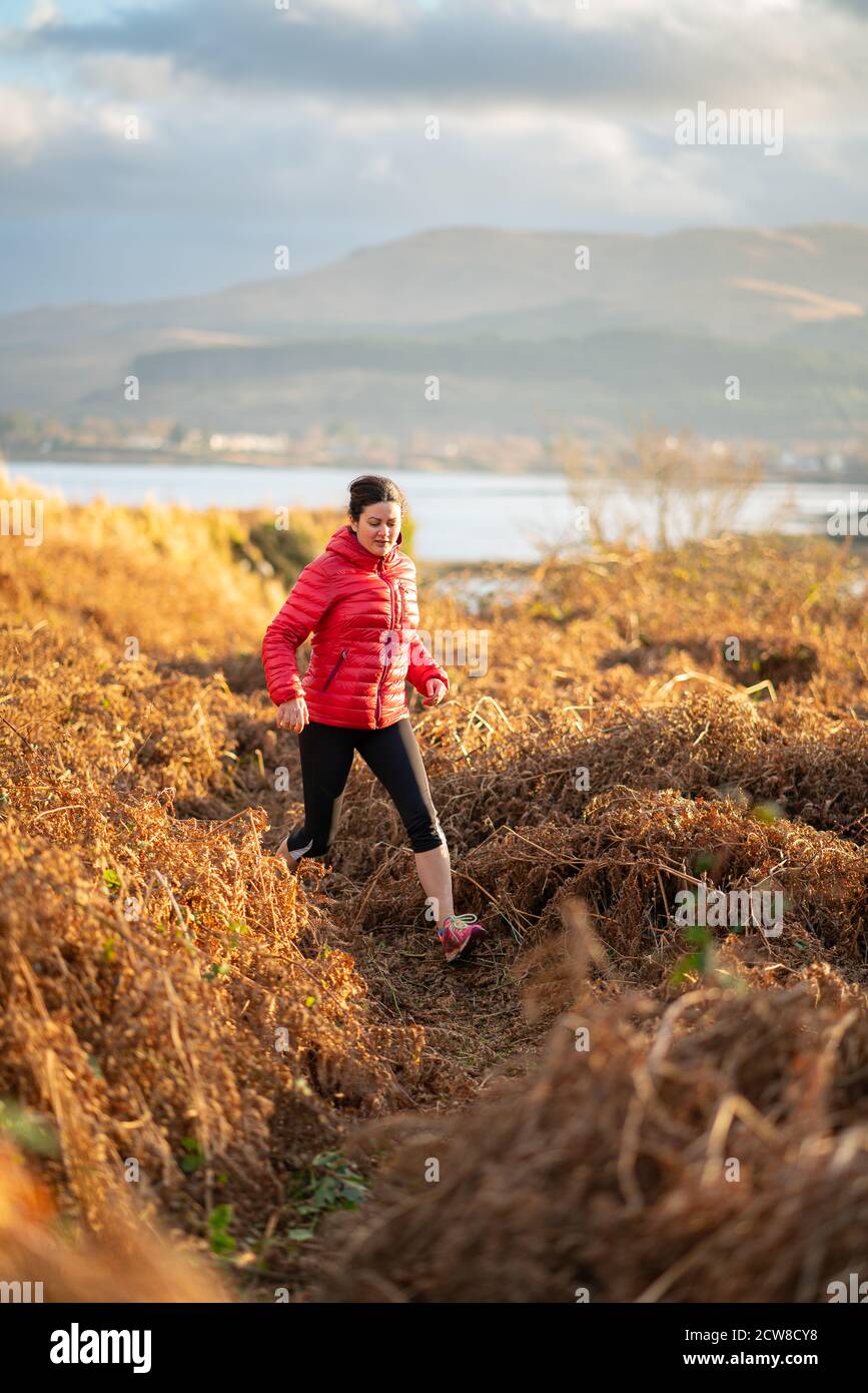 Woman trail running uk hi-res stock photography and images - Alamy