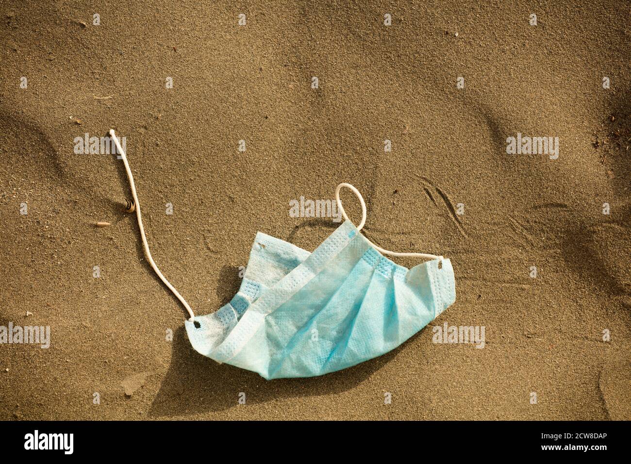 Waste during COVID-19. Scrapped to ocean coronavirus single-use face ...