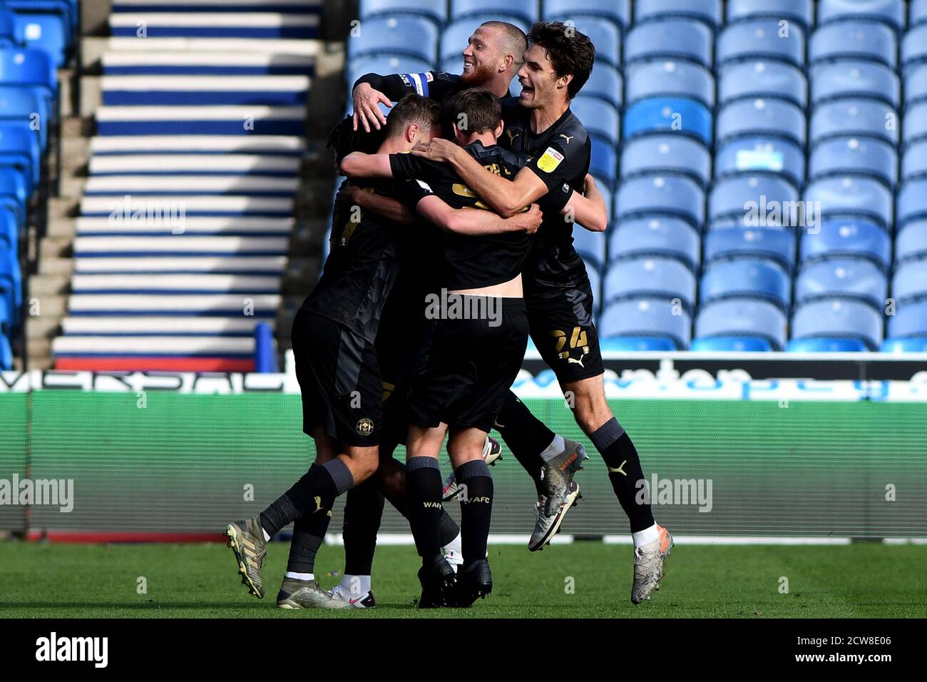 Tom James of Wigan Athletic is congratulated after scoring his teams ...