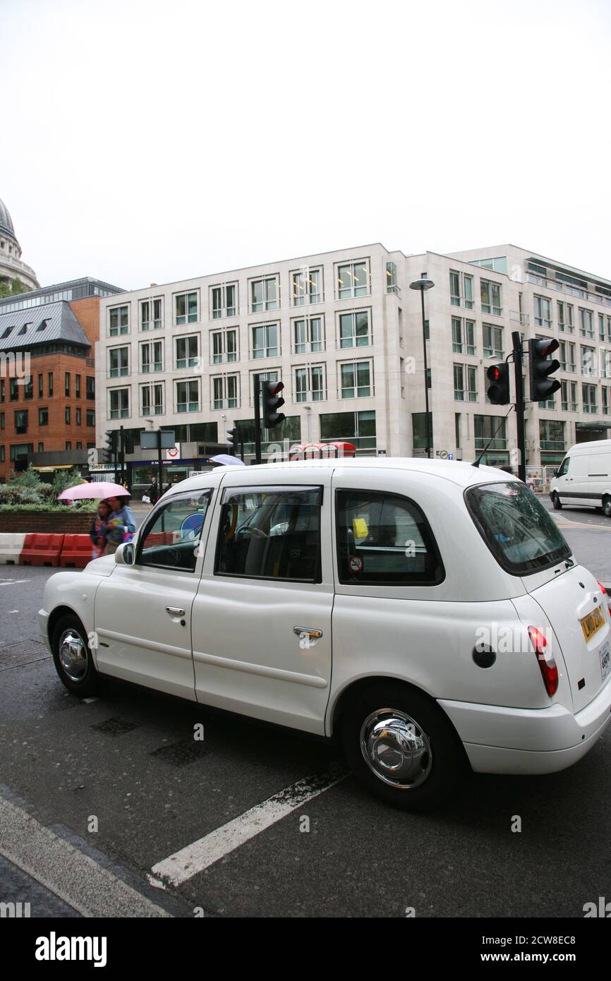 Lonodn, UK - August 12, 2010 : Taxi in the street of London on May 8 ...