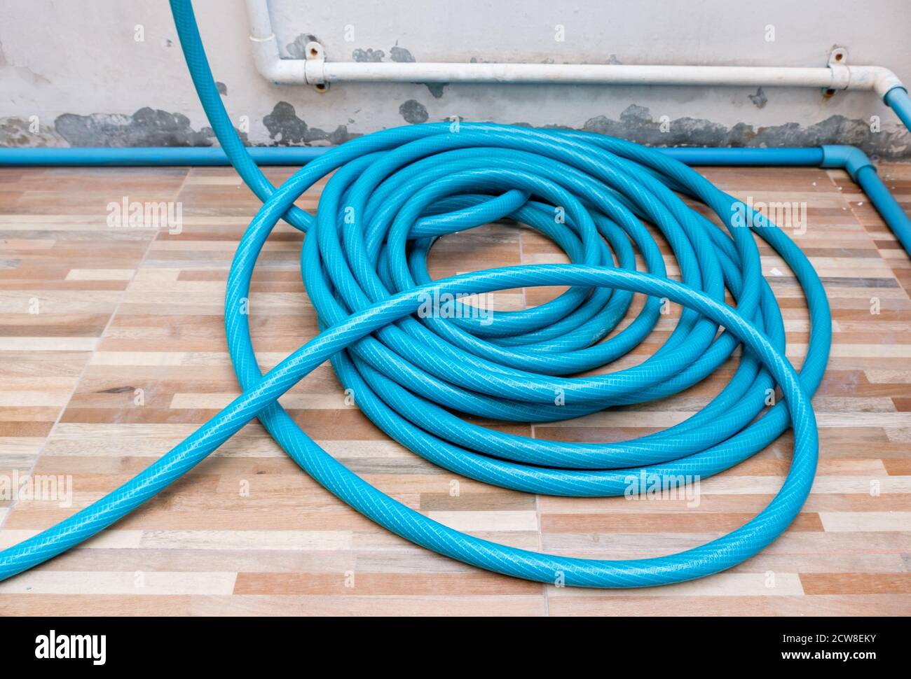 Hose on floor hi-res stock photography and images - Alamy