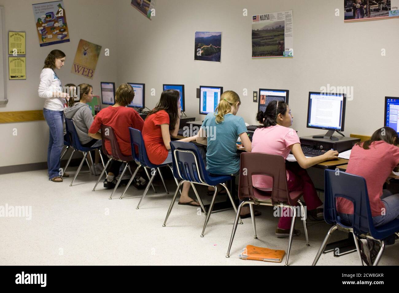 Pflugerville, TX May 30, 2008: Female teacher supervises students in ...