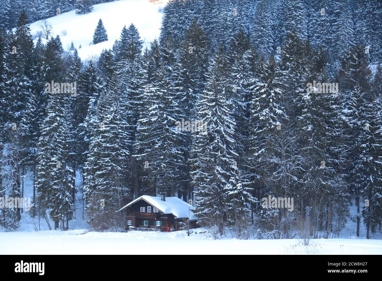 alpine winter landscape with cabin and snow Stock Photo - Alamy