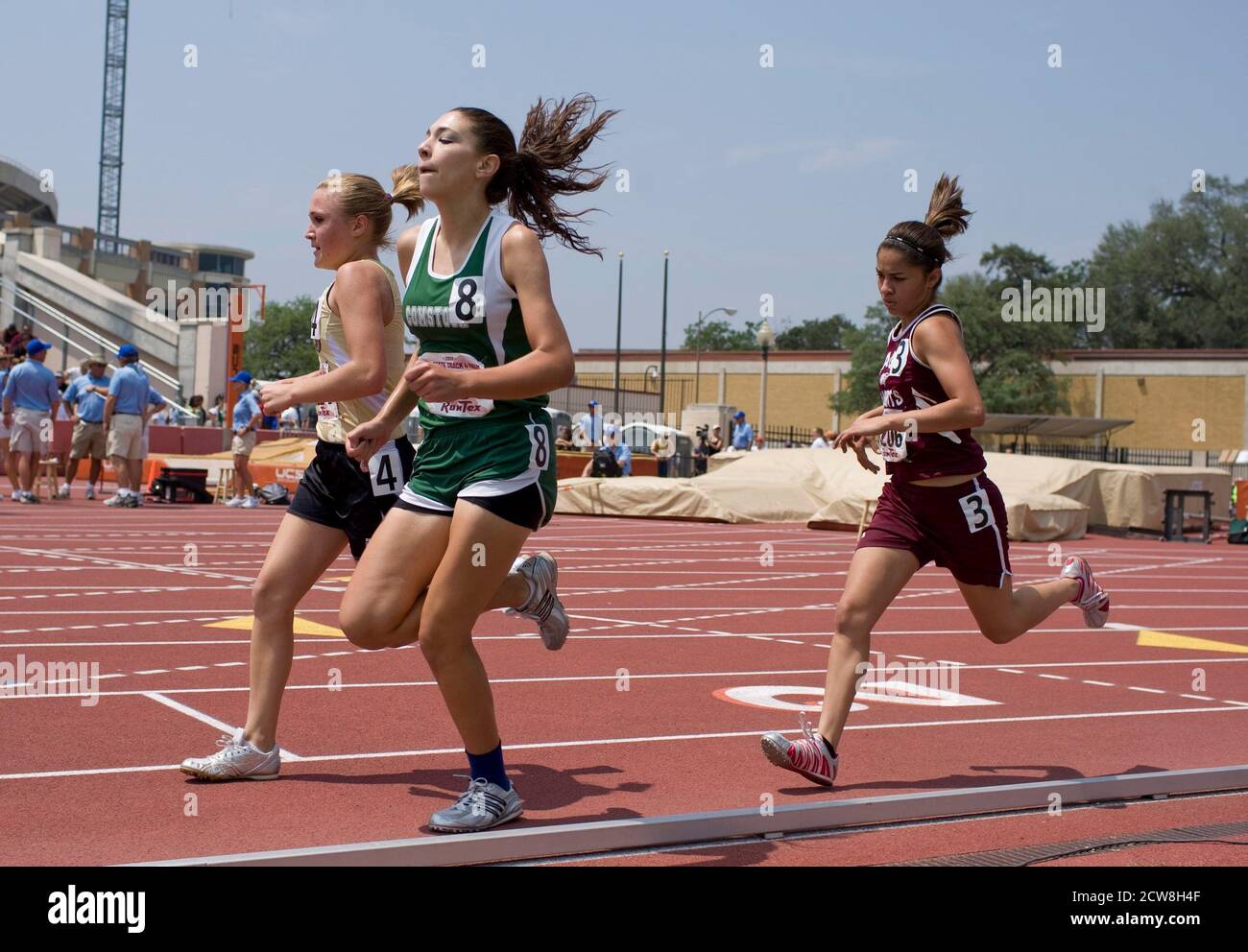 Austin, TX May 10, 2008: Anglo and Hispanic girls compete in the 1600 ...