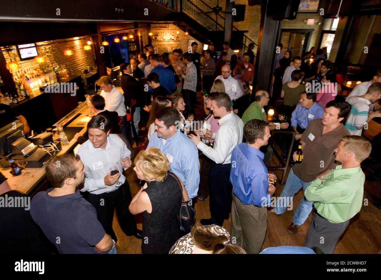 Austin, TX: May 13, 2008. Cocktail party at downtown Austin lounge to ...