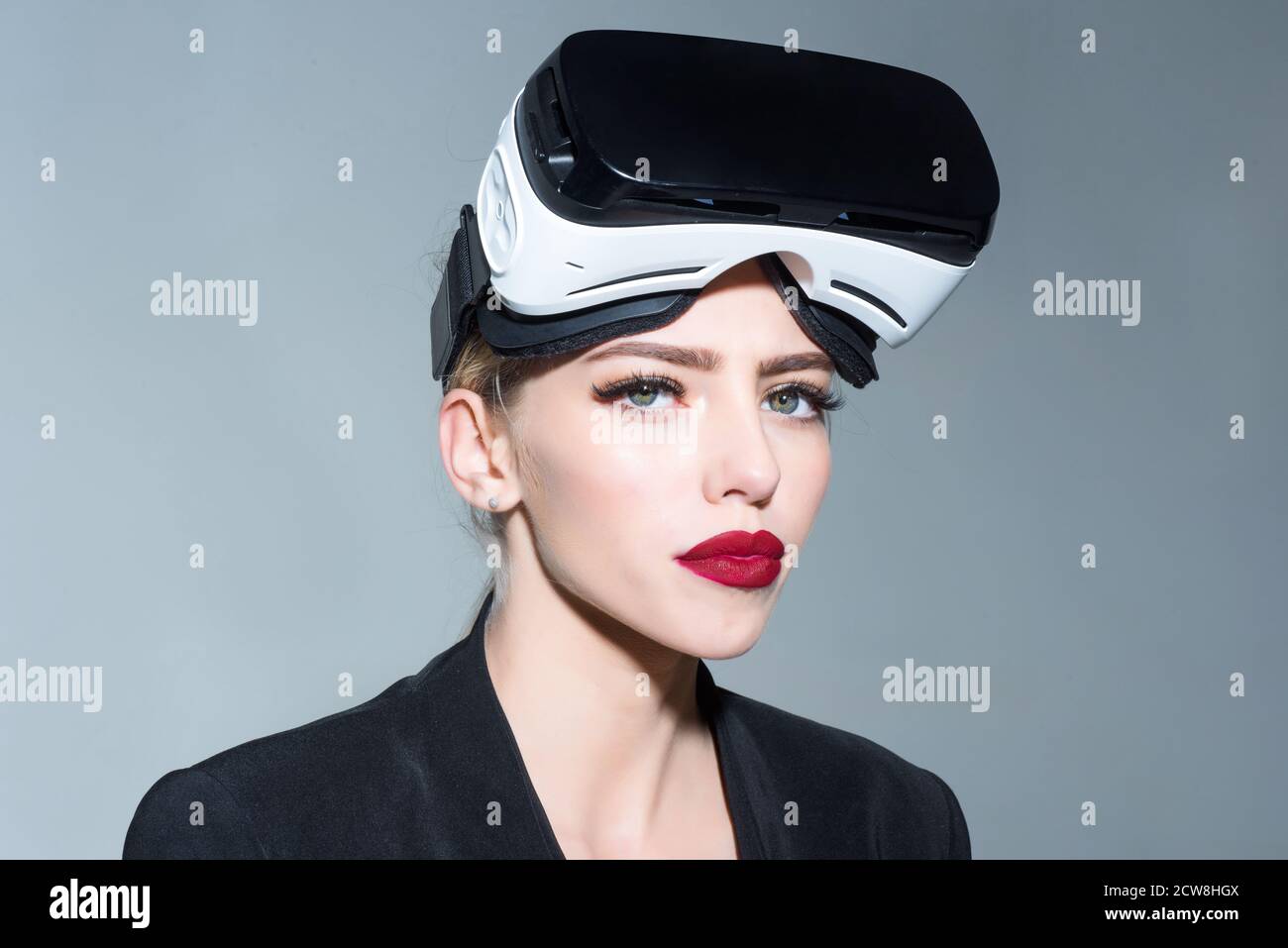 Virtual reality. Beautiful woman in virtual reality headset. Girl in ...