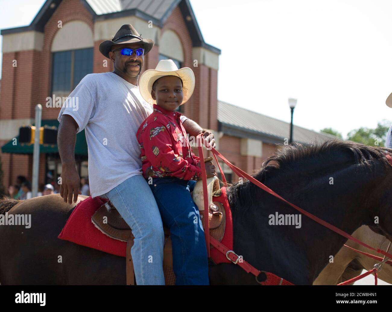 Father son horse riding hi-res stock photography and images - Alamy