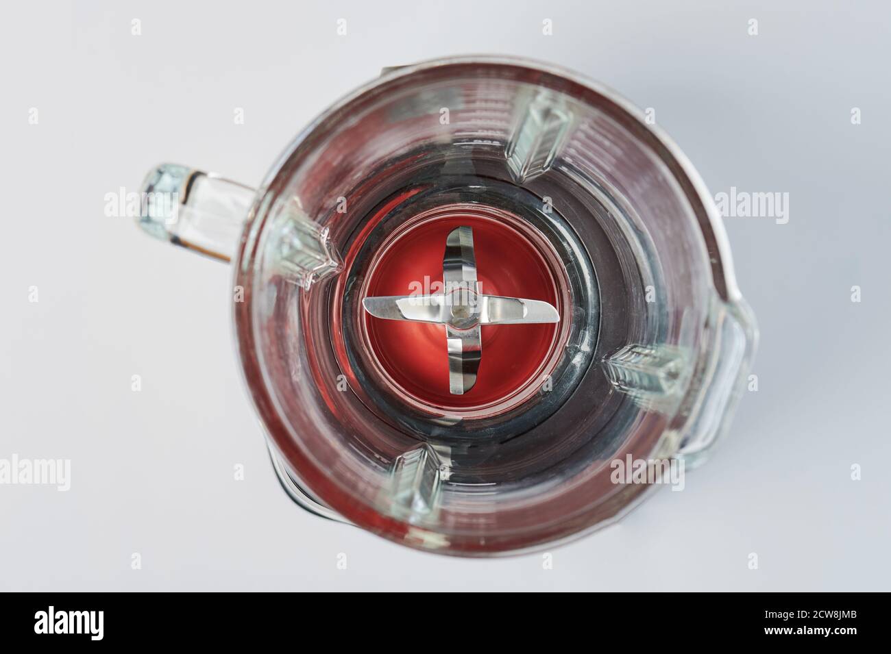 Glass cup with blades of mixer above top view isolated Stock Photo - Alamy