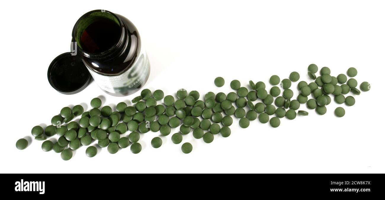 Chlorella Pills with Case Panorama isolated on white Background Stock ...