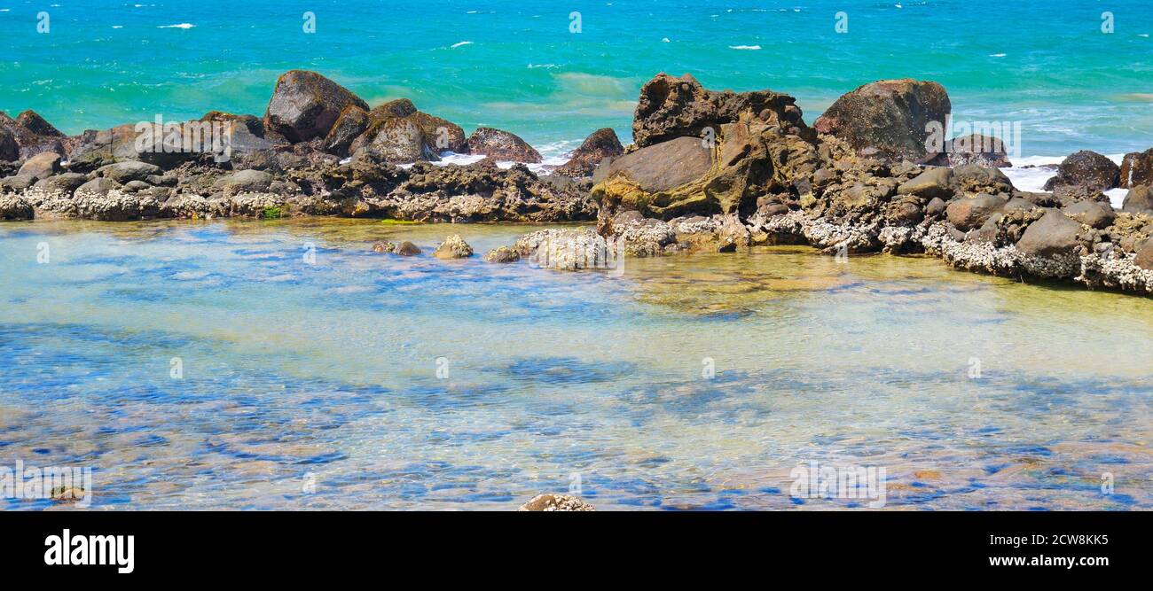 The lagoon is separated from the ocean by a coral reef.Tropical ...