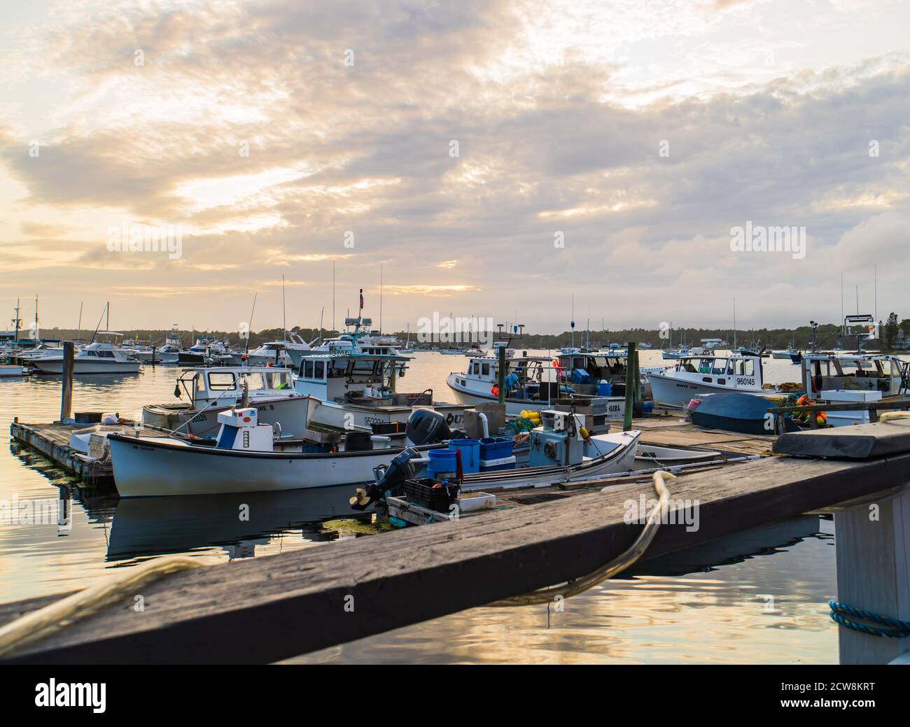 Fishing boat docked at wharf hi-res stock photography and images - Alamy