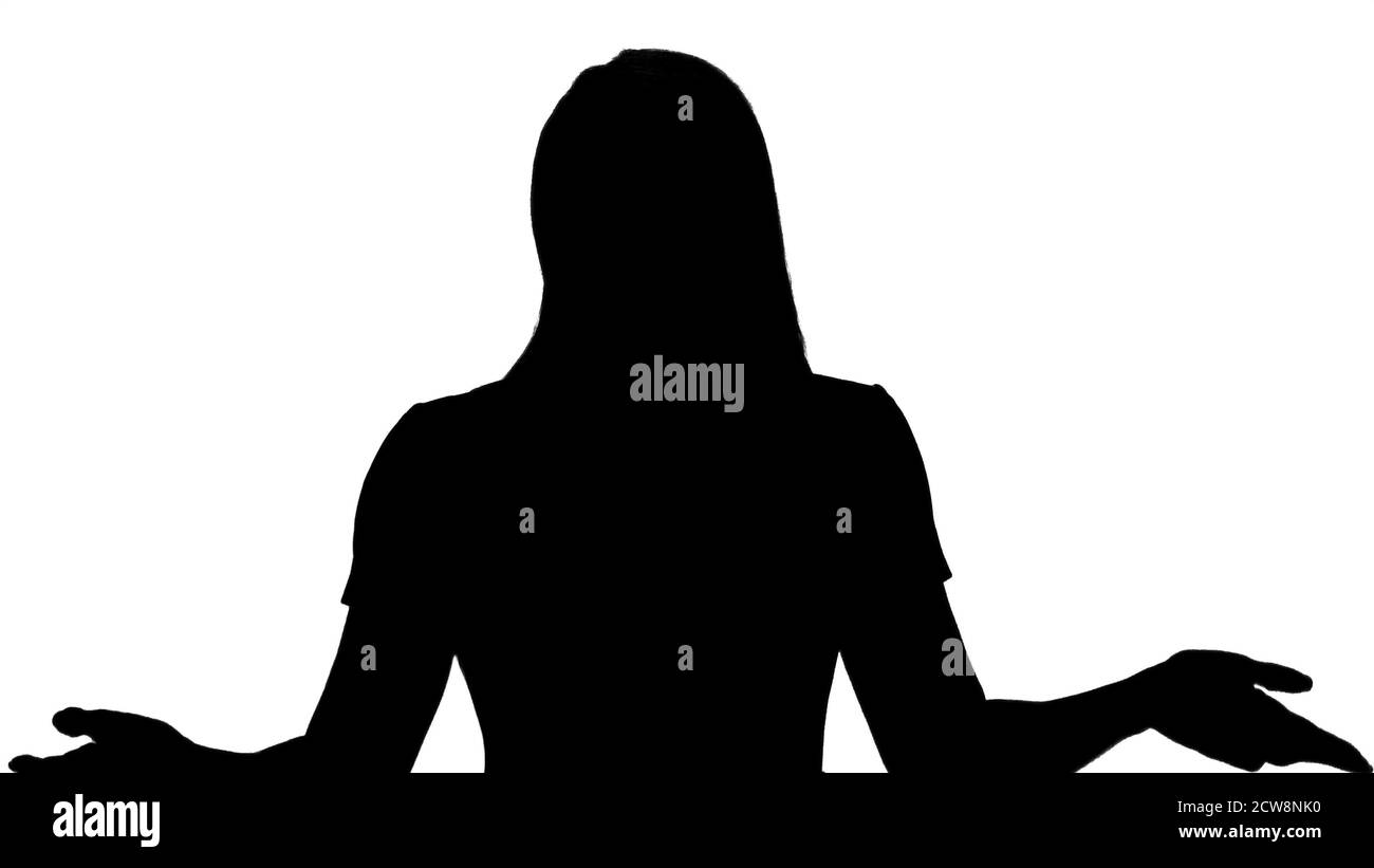 Silhouette Woman in pink talking to the camera Stock Photo - Alamy
