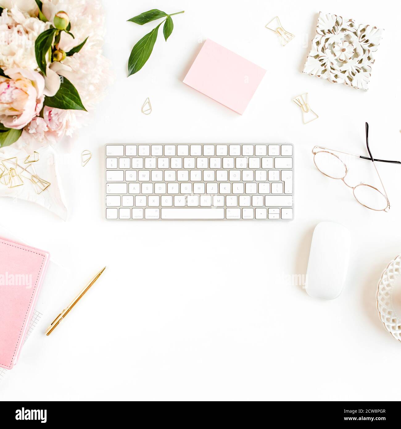 Flat lay women's office desk. Female workspace with computer, pink ...