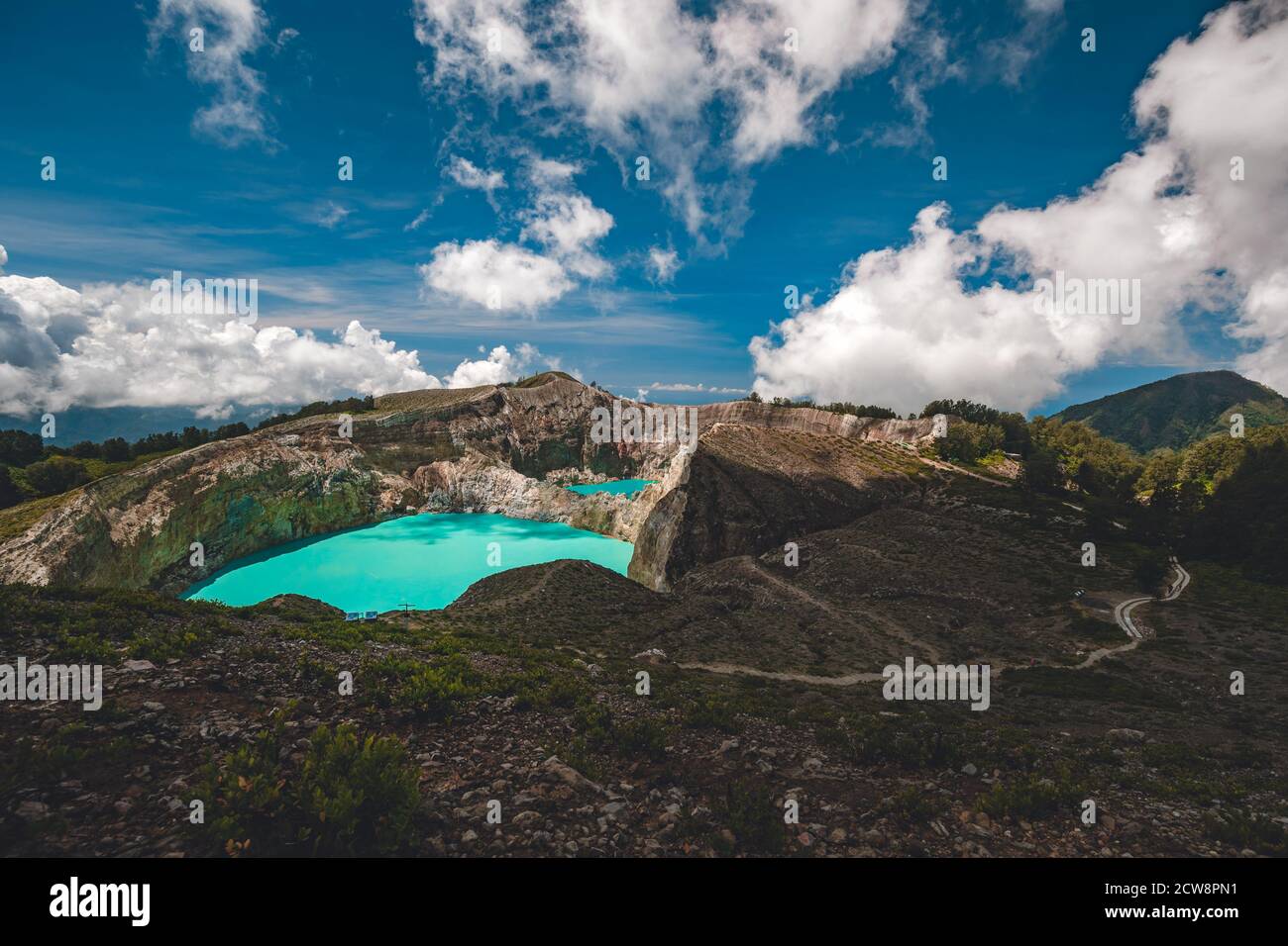 Indonesia volcano rocks crater lakes on green mountain Kelimutu peak ...