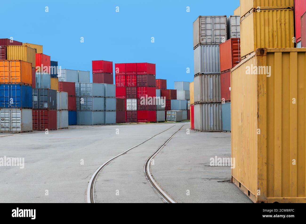 Port with containers and rail tracks Stock Photo - Alamy