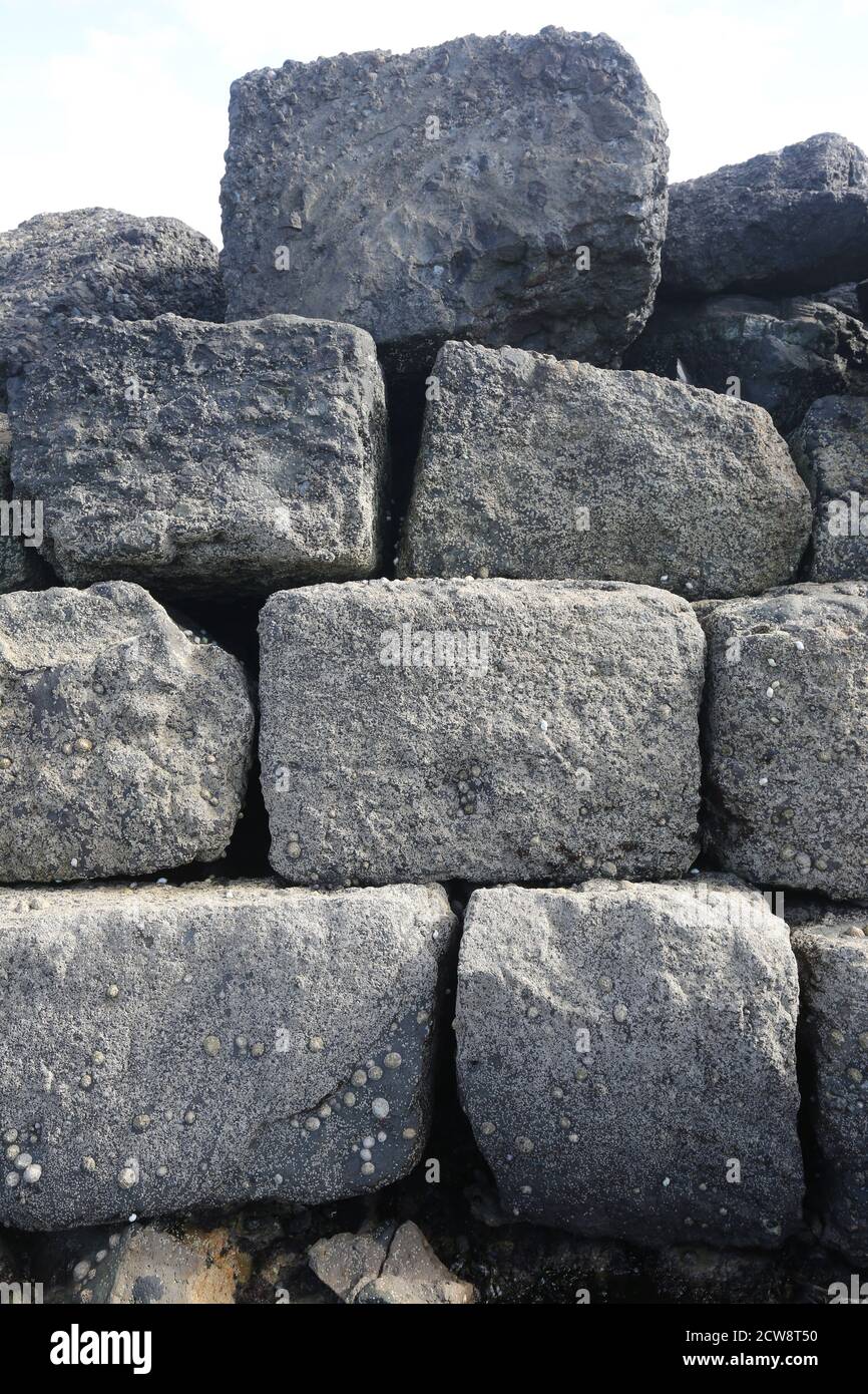 Dunure, Ayrshire, Scotland, UK. Sea defences made from rocks and blocks ...