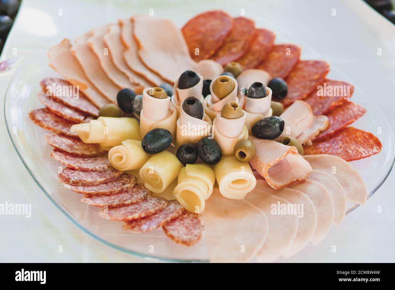 Deli food catering on the plate for birthday reception Stock Photo - Alamy
