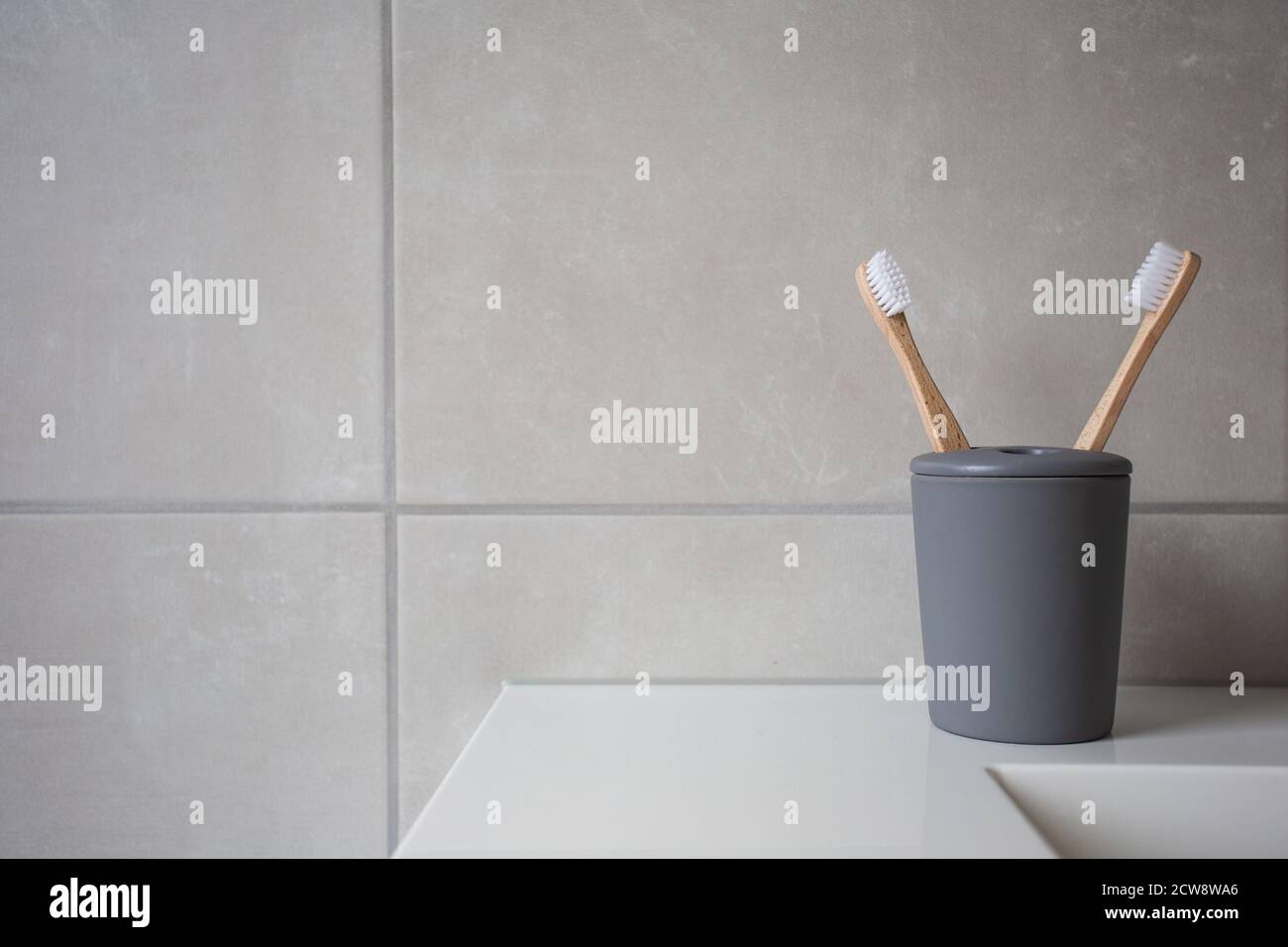 Eco Friendly bamboo natural organic toothbrushes in grey holder, with ...