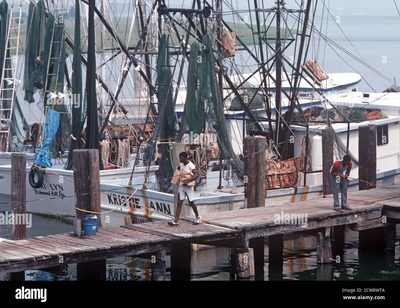 AFRICAN AMERICAN FISHERMAN AND SHRIMP FISHING BOATS ON SAVANNAH RIVER ...