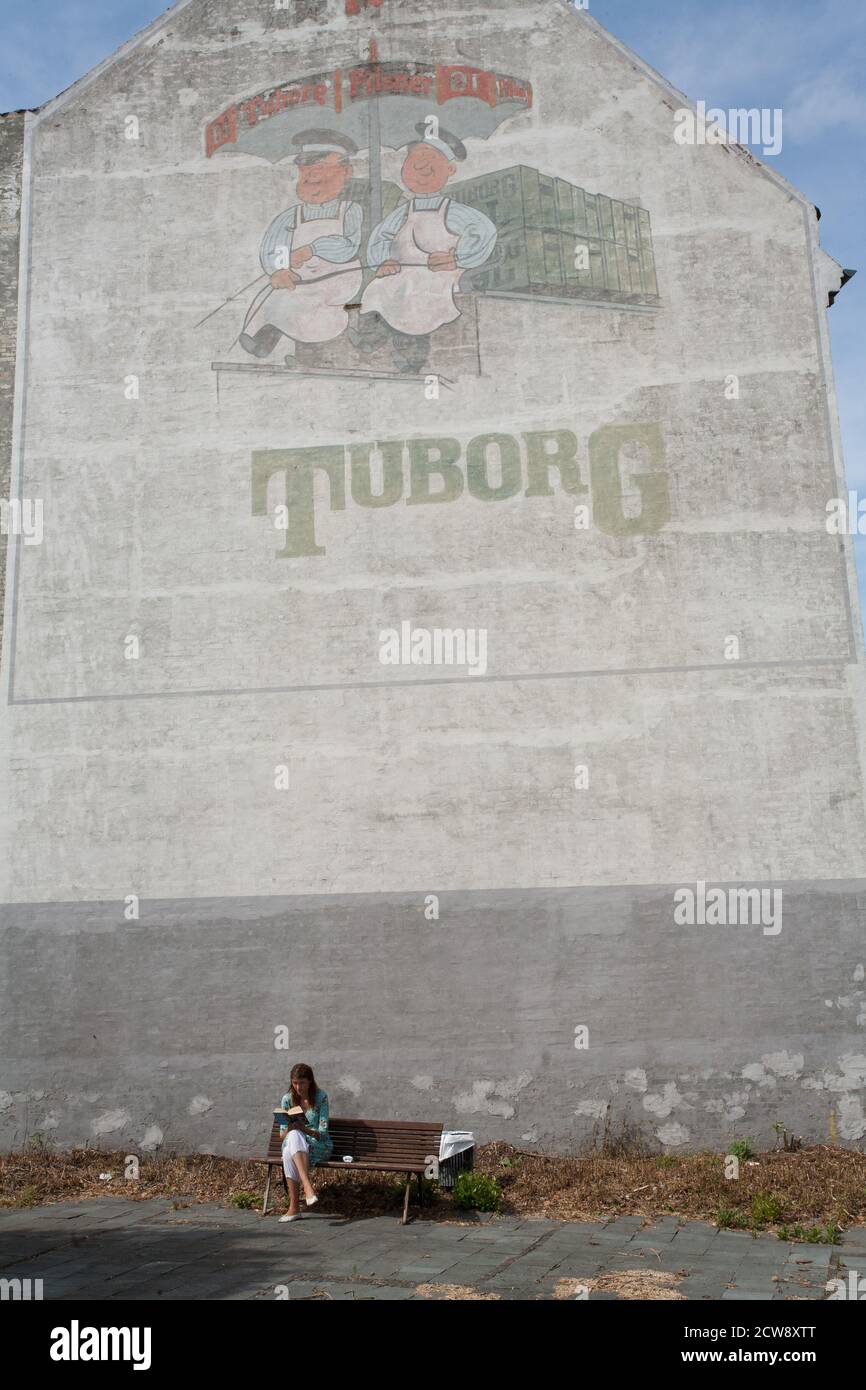 Wall with an old Tuborg add in Denmark Stock Photo - Alamy