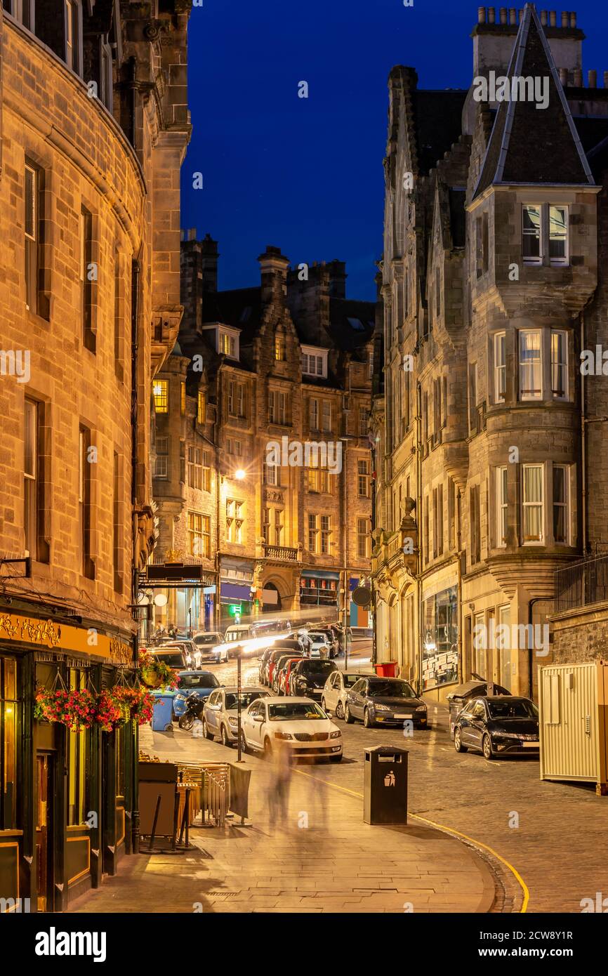 Cityscape of Royal Mile street Edinburgh old town at sunset dusk ...