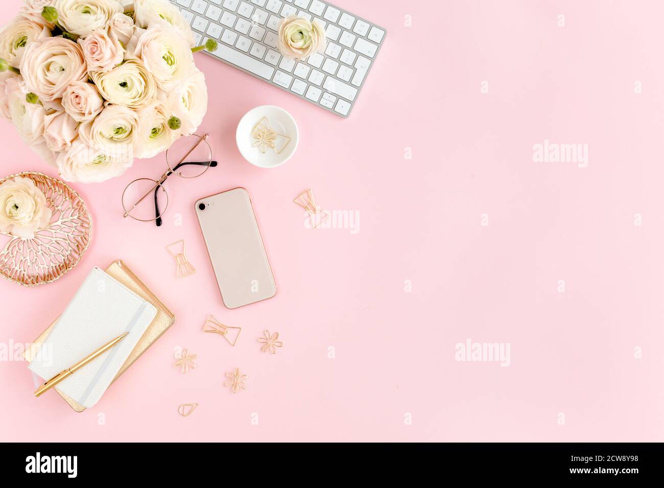Stylized, pink women's home office desk. Workspace with computer ...