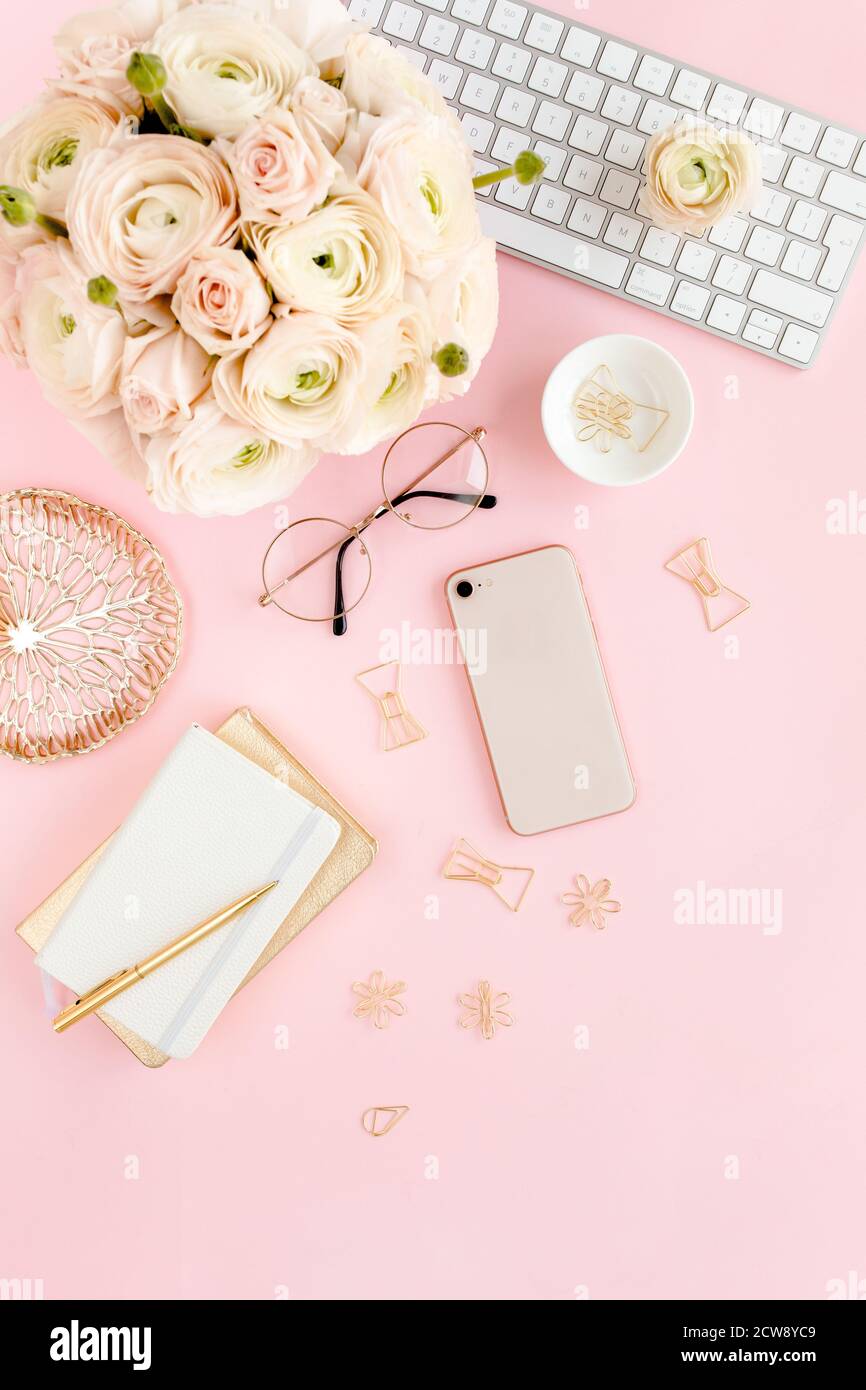 Stylized, pink women's home office desk. Workspace with computer ...